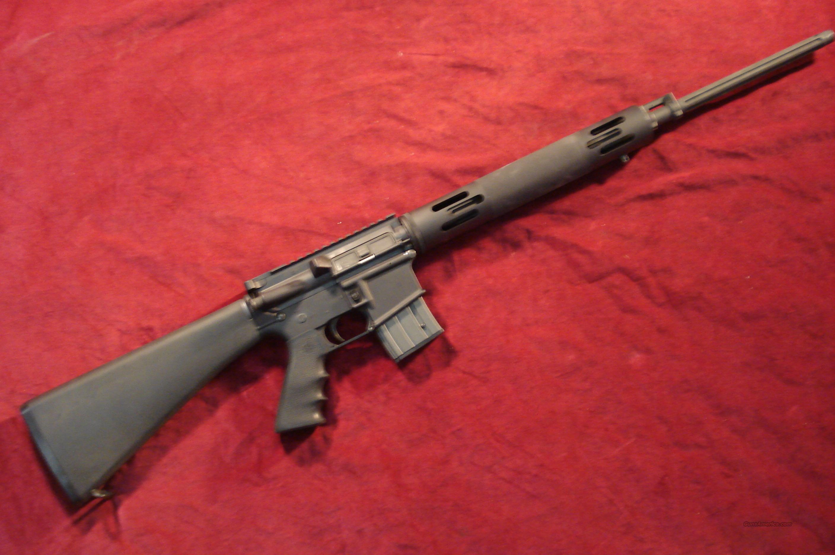 BUSHMASTER VARMINTER 24" FLUTED 223CAL. USED for sale