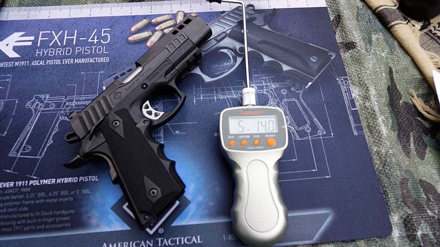 American Tactical's Polymer-Framed 1911 Pistol, the FXH-45 -- SHOT Show ...