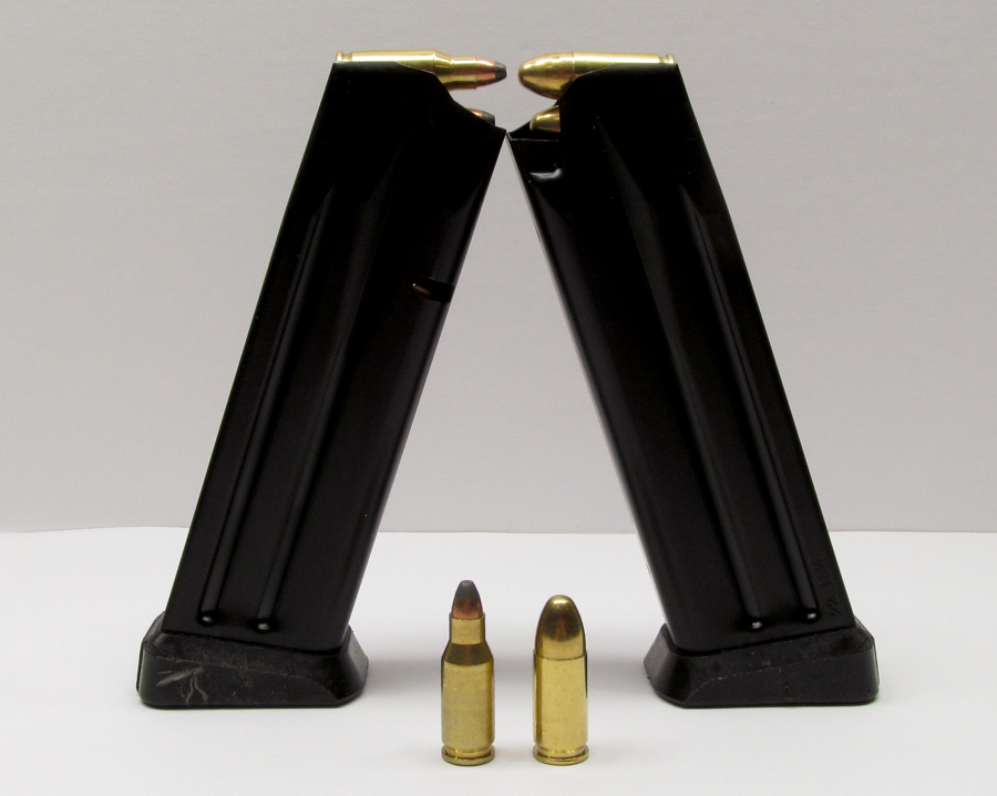 Fire-Breathing, Multi-Cal 1911: Rock Island Armory’s .22 TCM/9mm Combo ...