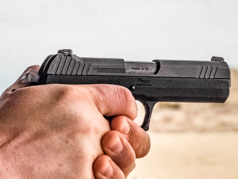 Is This The Greatest Carry Gun Ever Made? SIG's New P210 Carry - SHOT ...