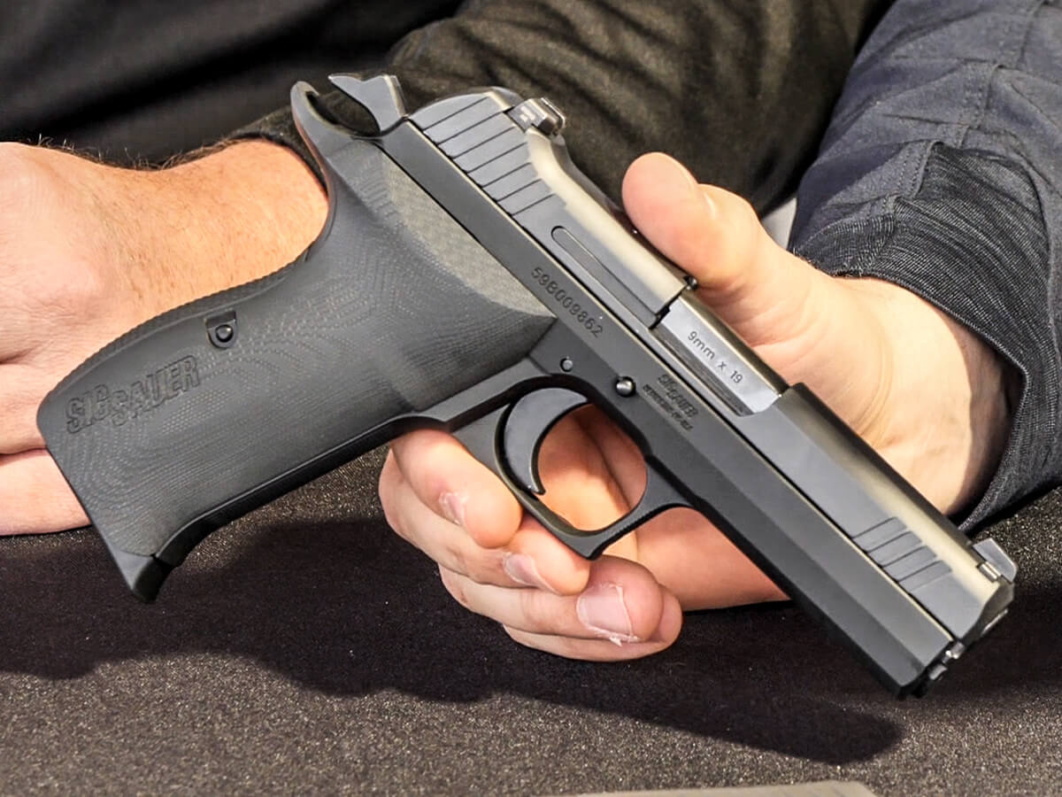 Is This The Greatest Carry Gun Ever Made? SIG's New P210 Carry - SHOT ...