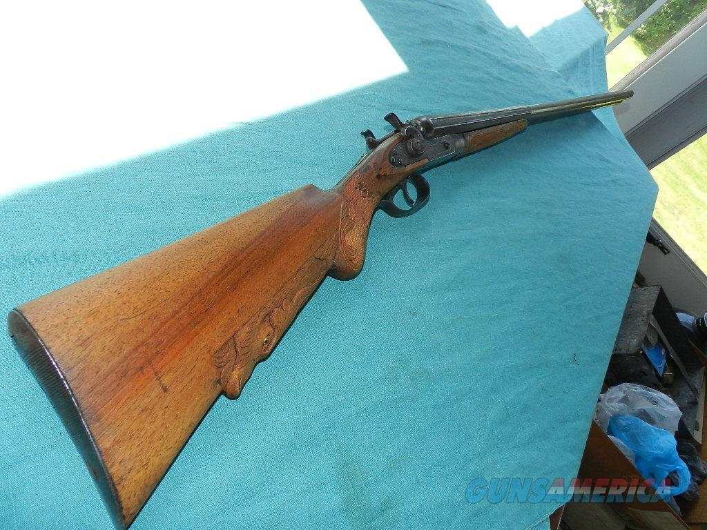 A VERY FANCY ENGRAVED 12GA DOUBLE SHOTGUN for sale